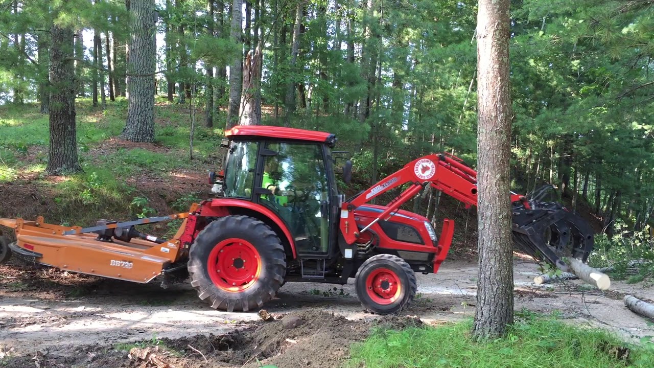 Demonstration of Removing Trees with a Tractor to Make a Parking Pad ...
