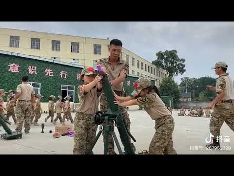 China teaching elementary school children how to use mortars