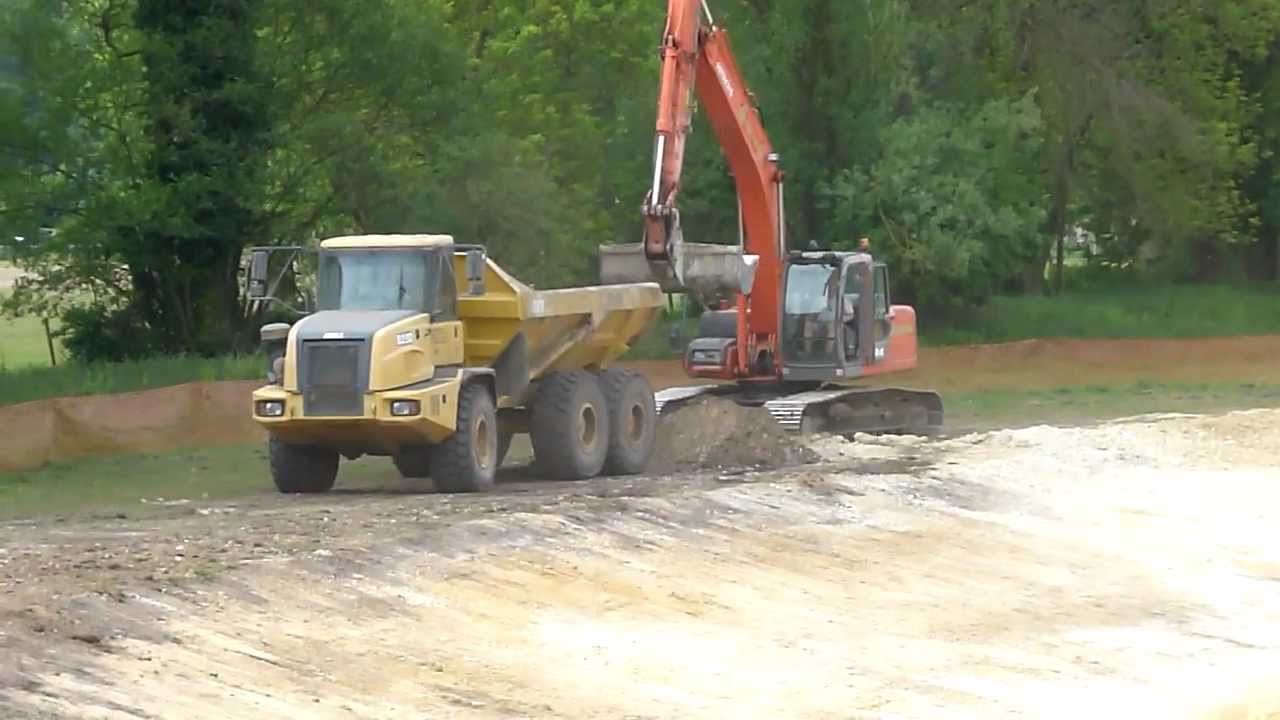 excavators at work digging fishing lakes!! - YouTube