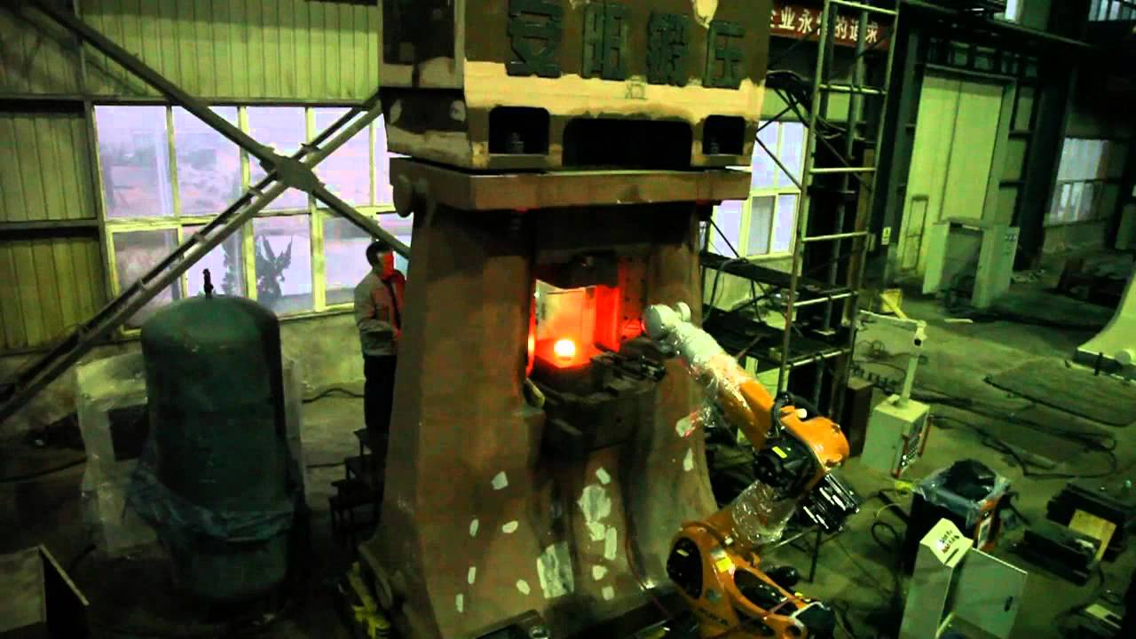 forging hammer forge steel balls, grinding balls match with robot - YouTube