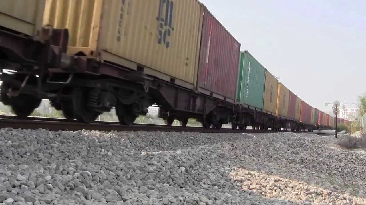 Freight train passing in Tel Aviv, Israel. - YouTube