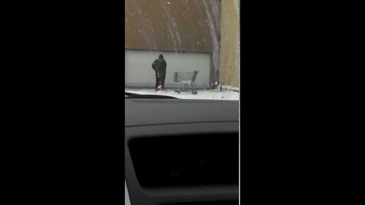 Only at WalMart. Shoveling snow into a shopping cart. - YouTube