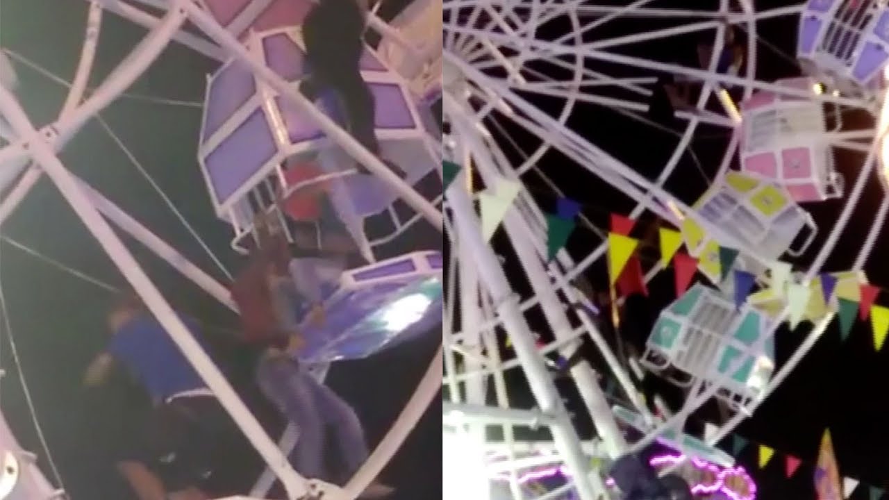 Ferris wheel carriage flips upside down with family inside - YouTube