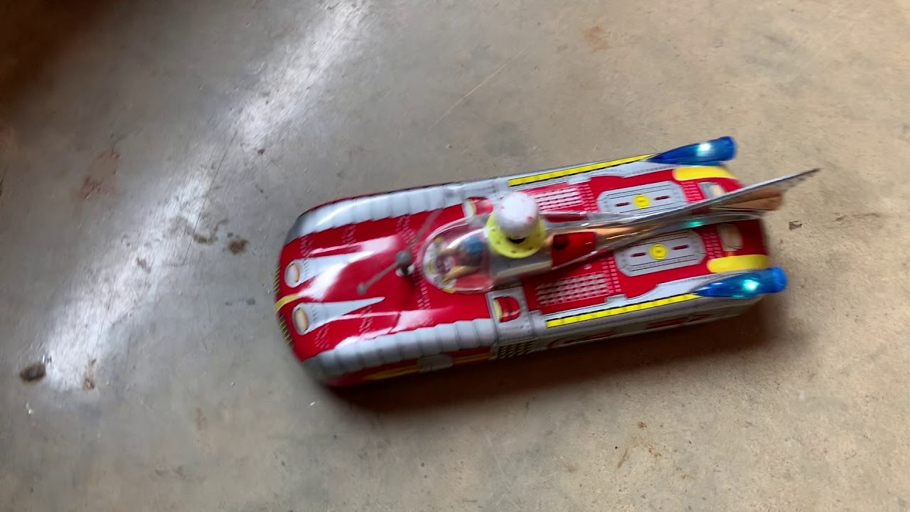 Space Ship with Floating Ball Battery Operated Tin Toy - YouTube