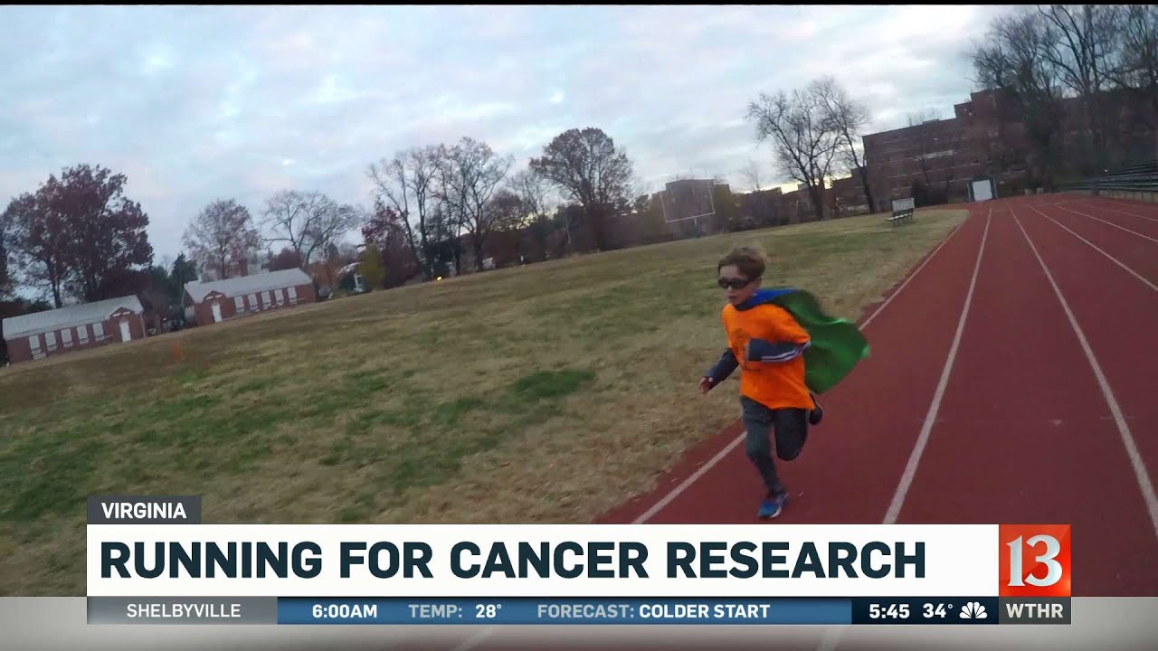 Child running for cancer research - YouTube