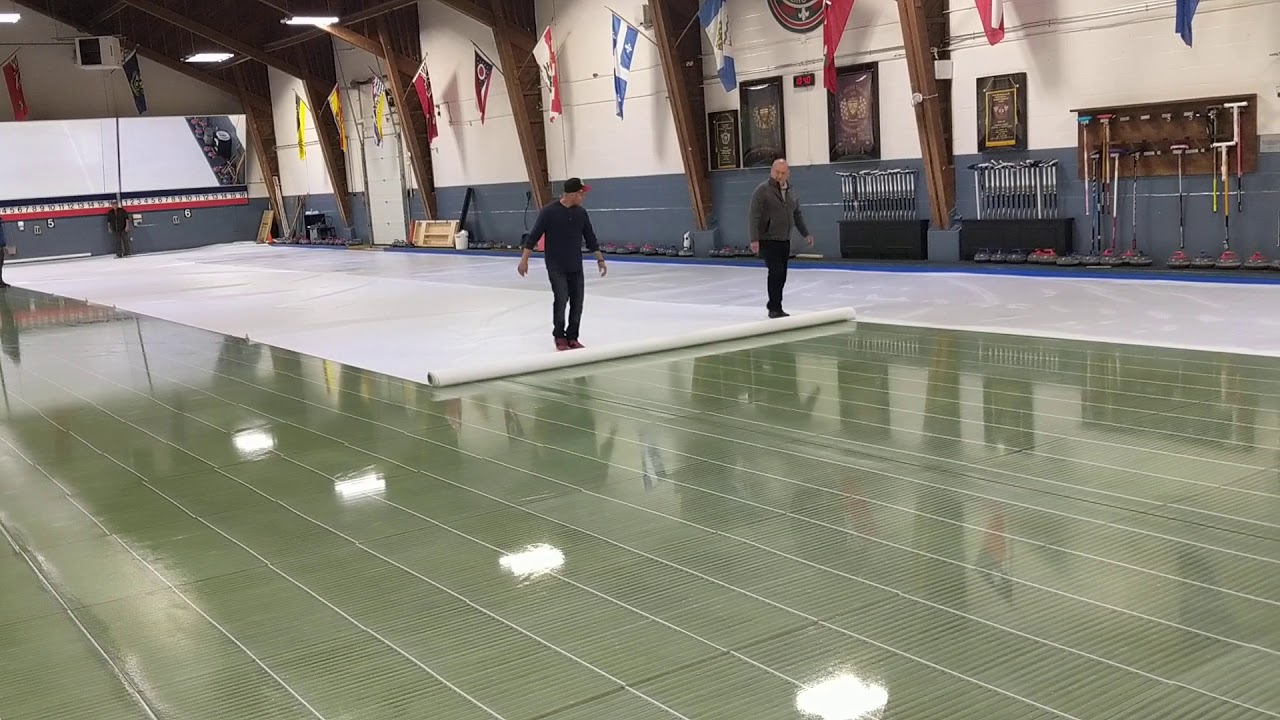Curling Ice Prep - Rolling out full-sheets from JetIce - YouTube