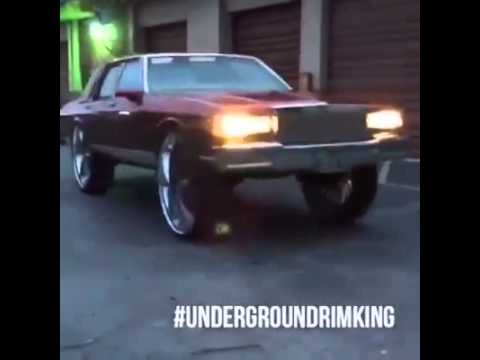 32" rims on a box chevy - YouTube