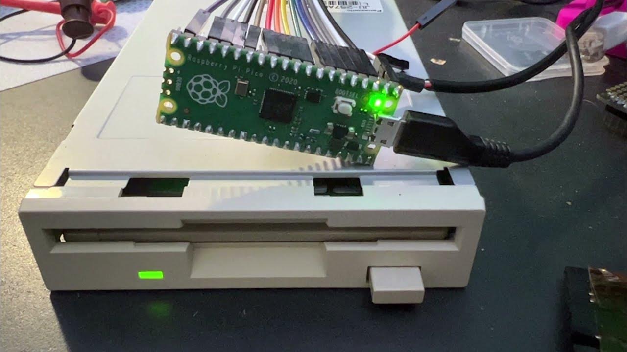 click ... click ... click ... that is the sound of a Raspberry Pi Pico RP2040 + floppy drive ...