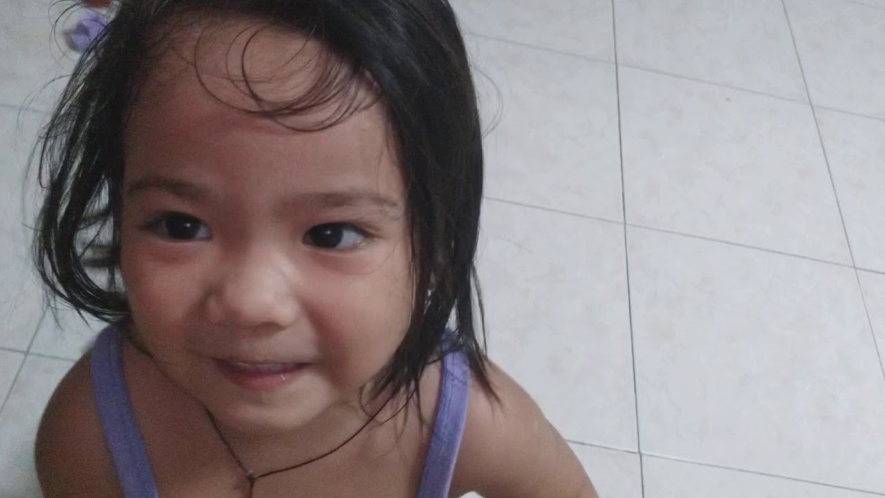 Cute baby cleaning up toys - YouTube