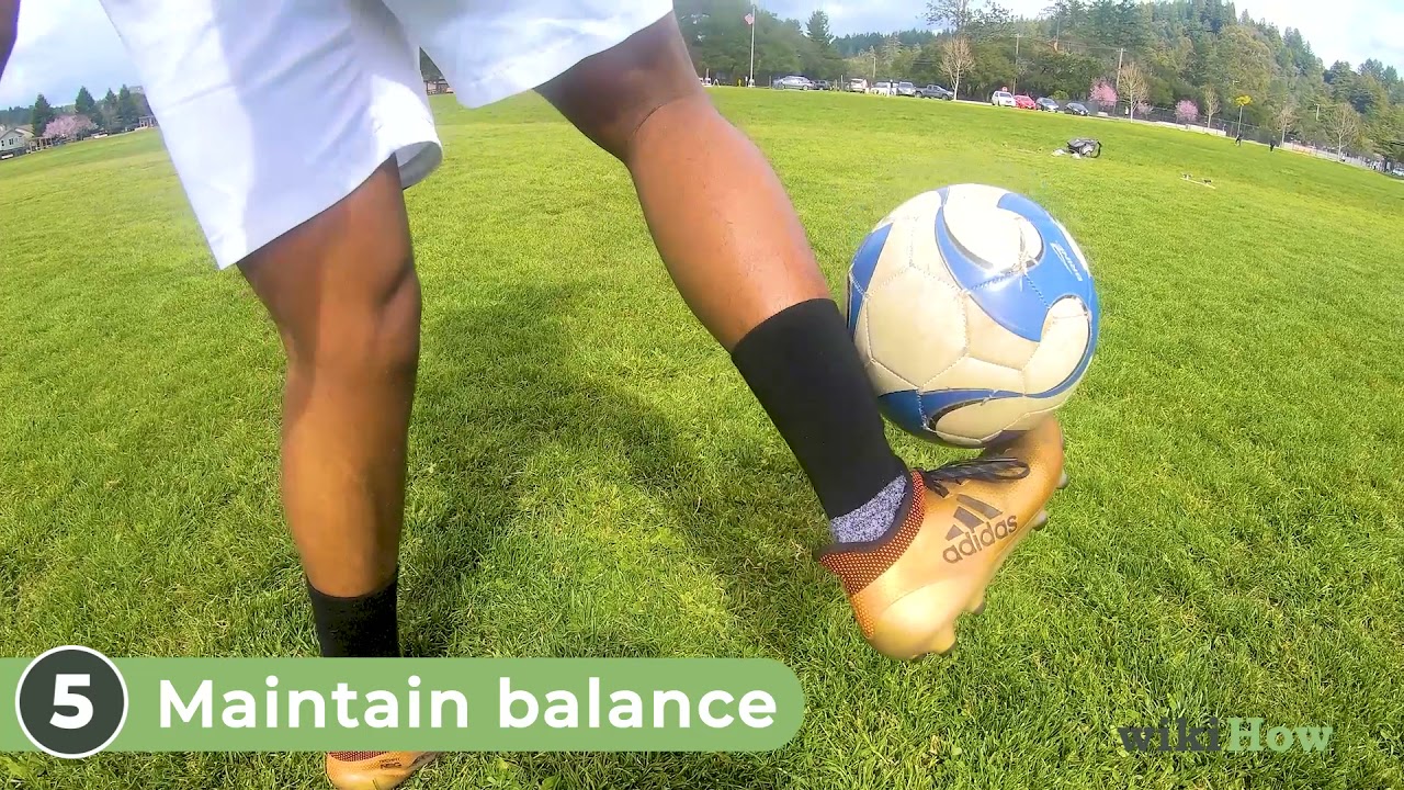 How to Balance a Soccer Ball on Your Foot - YouTube