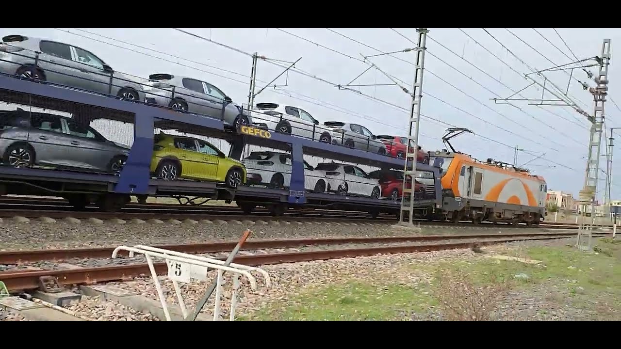 A train transporting cars in Morocco towards the world and greetings ...