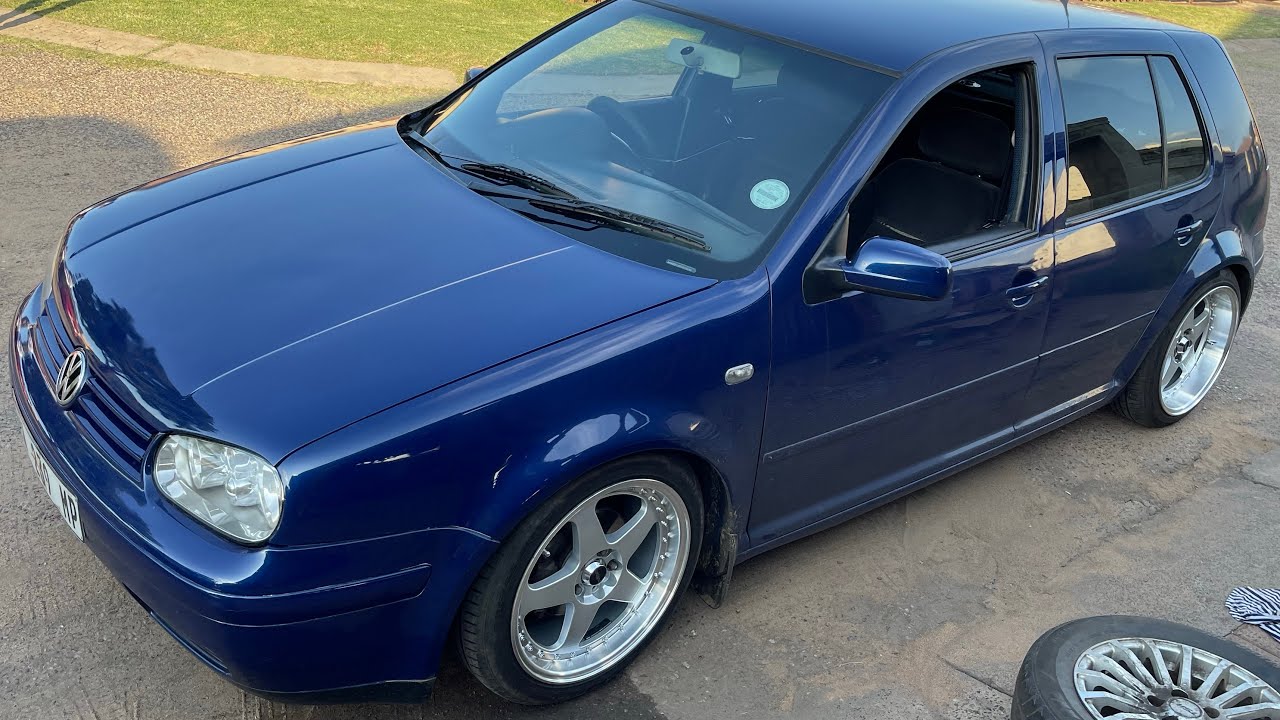 Installing a boot spoiler on a VW Golf 4 - YouTube