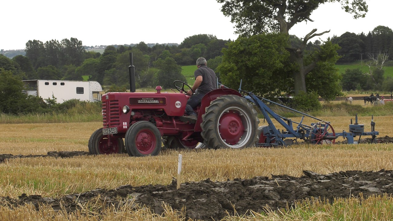 Mccormick B275 with a trailed plough and a David Brown 990 - YouTube