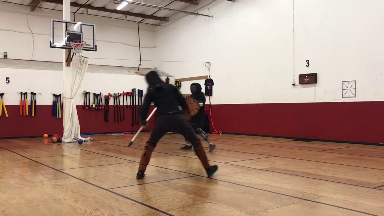 Spear and shield fighting - YouTube