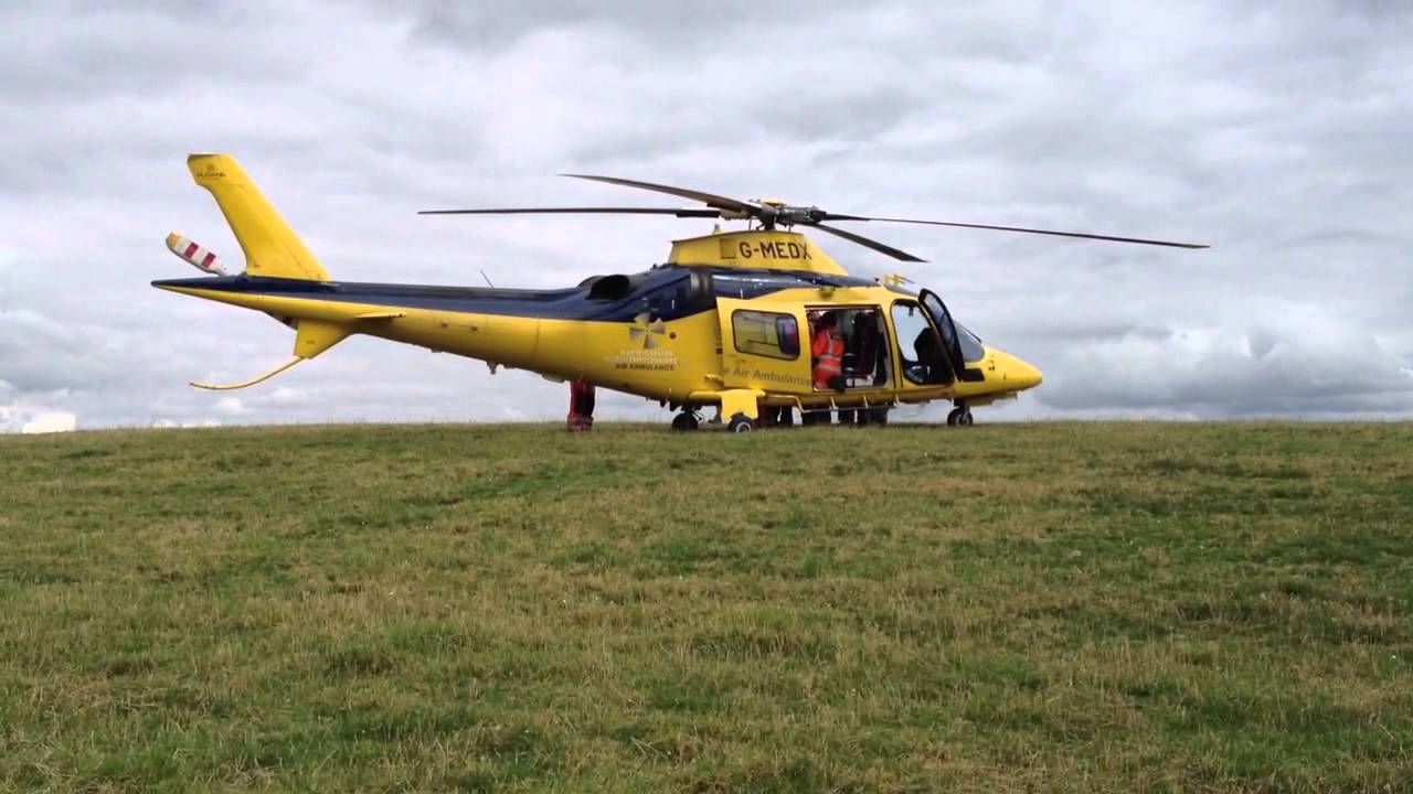 Helimed Air ambulance landing and pickup from Bradwell in Derbyshire ...