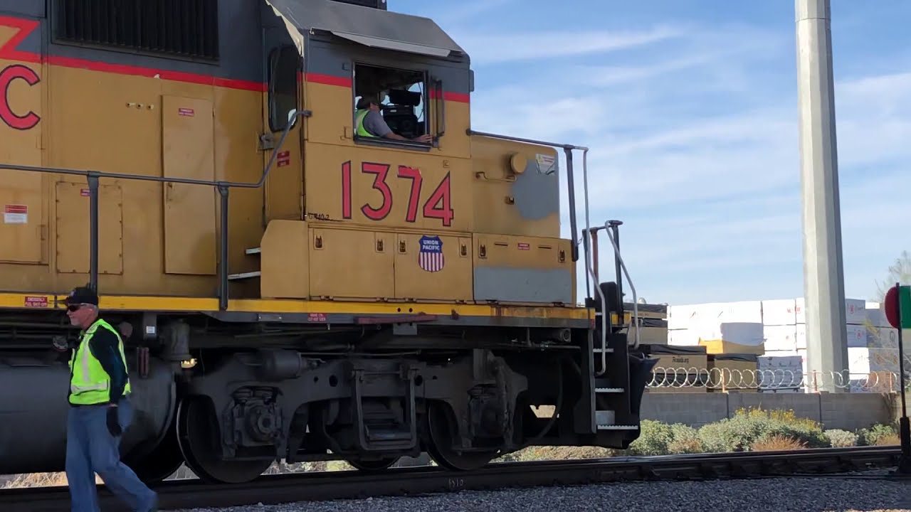 Union Pacific 1374 latching up the cars to be delivered - YouTube