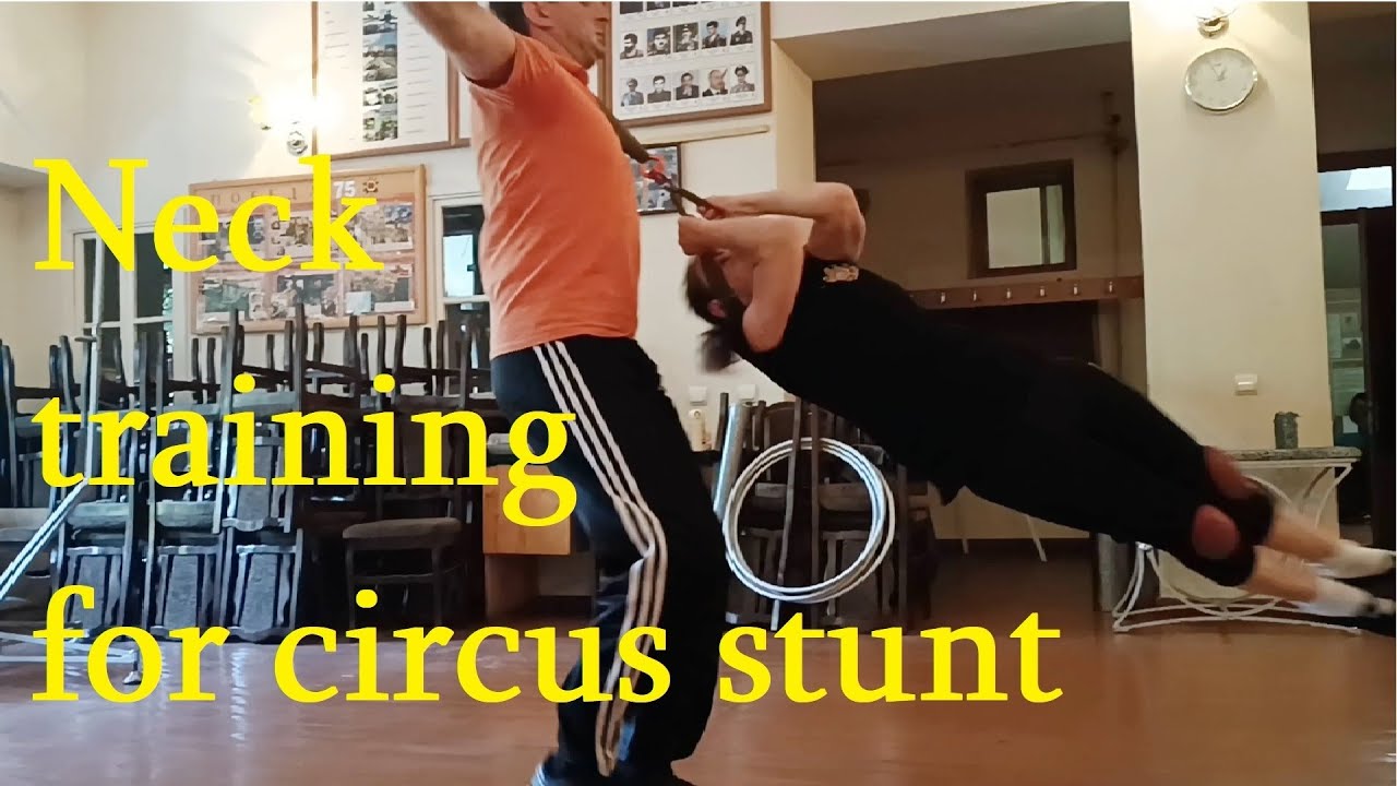 Neck training for circus stunt - YouTube