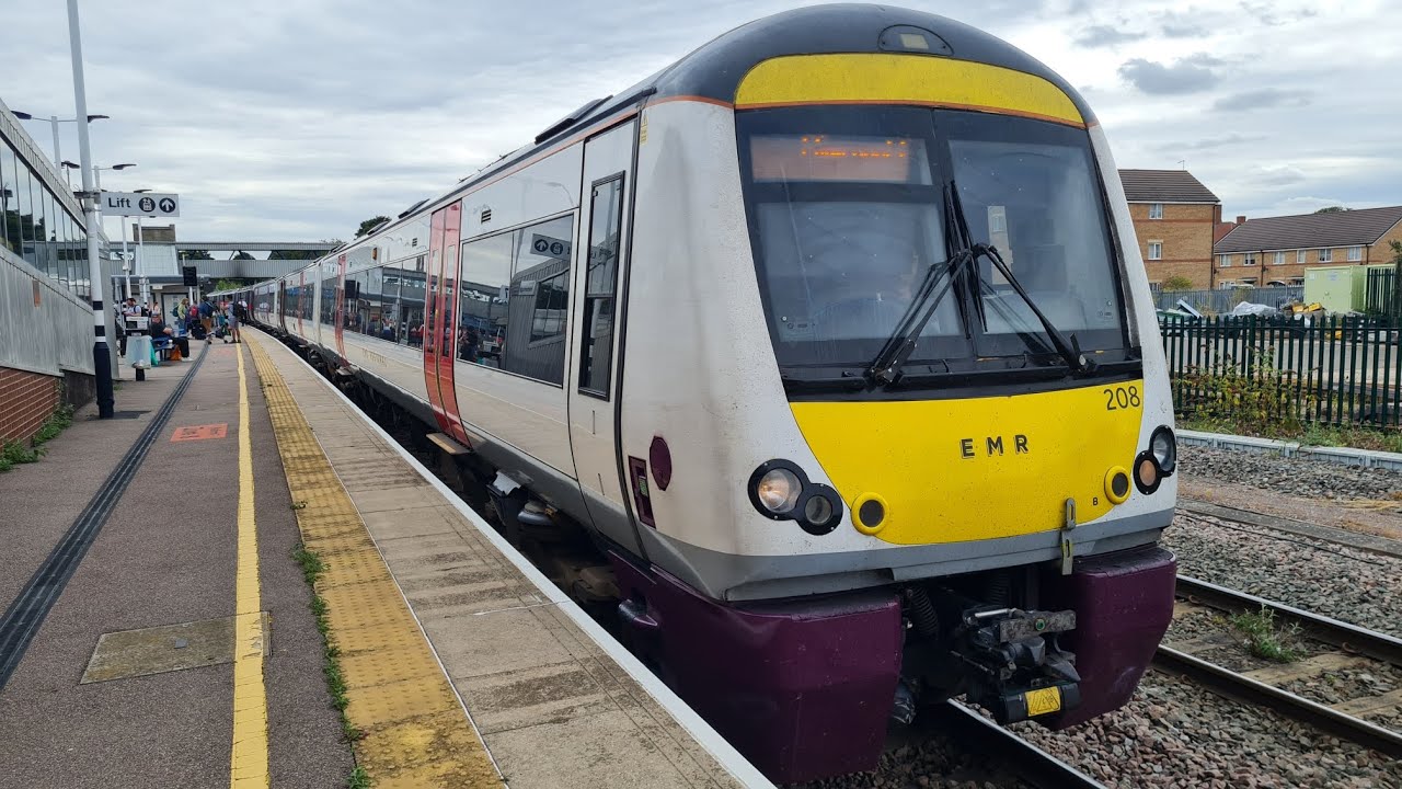6 car EMR !! 170423 and 170208 departing Peterborough for Liverpool ...