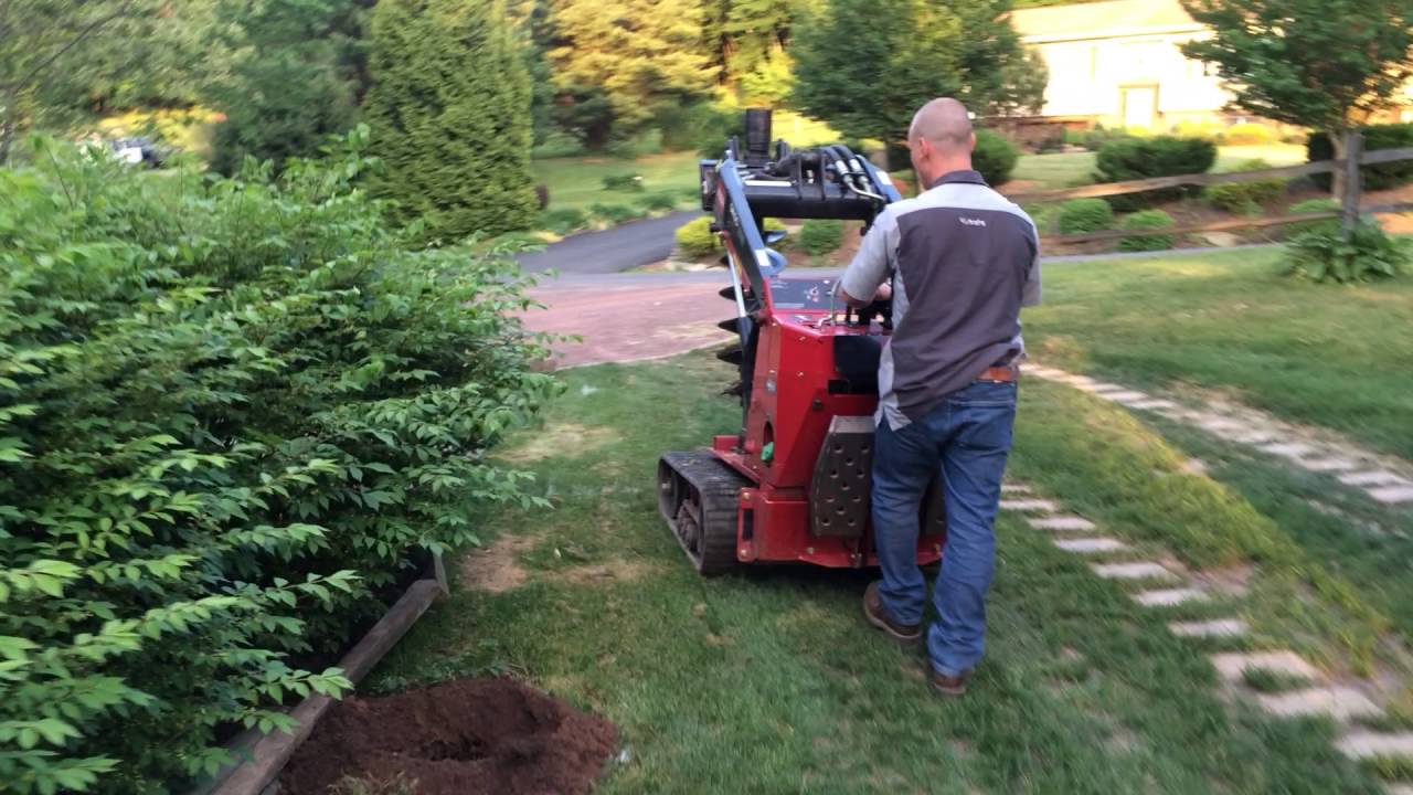 Toro Dingo great for digging holes for fence posts, trees, shrubs and ...