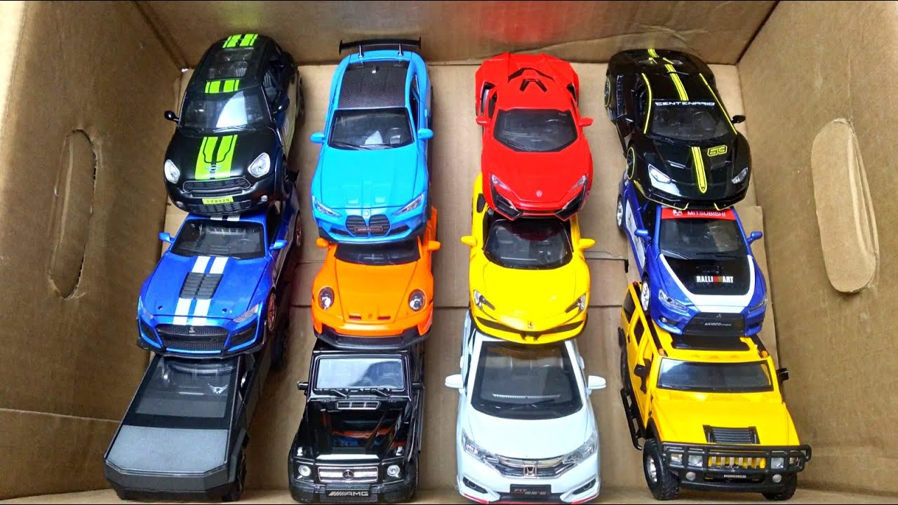Box Full of Model Cars Rolls Royce Cullinan, Lamborghini Huracan Sto ...