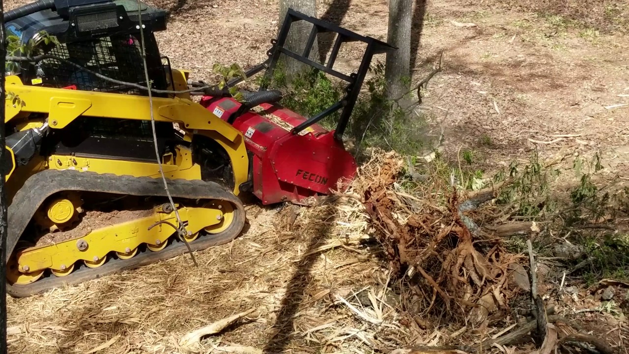 Cat 299D2 XHP Fecon Bull Hog forestry mulcher - YouTube