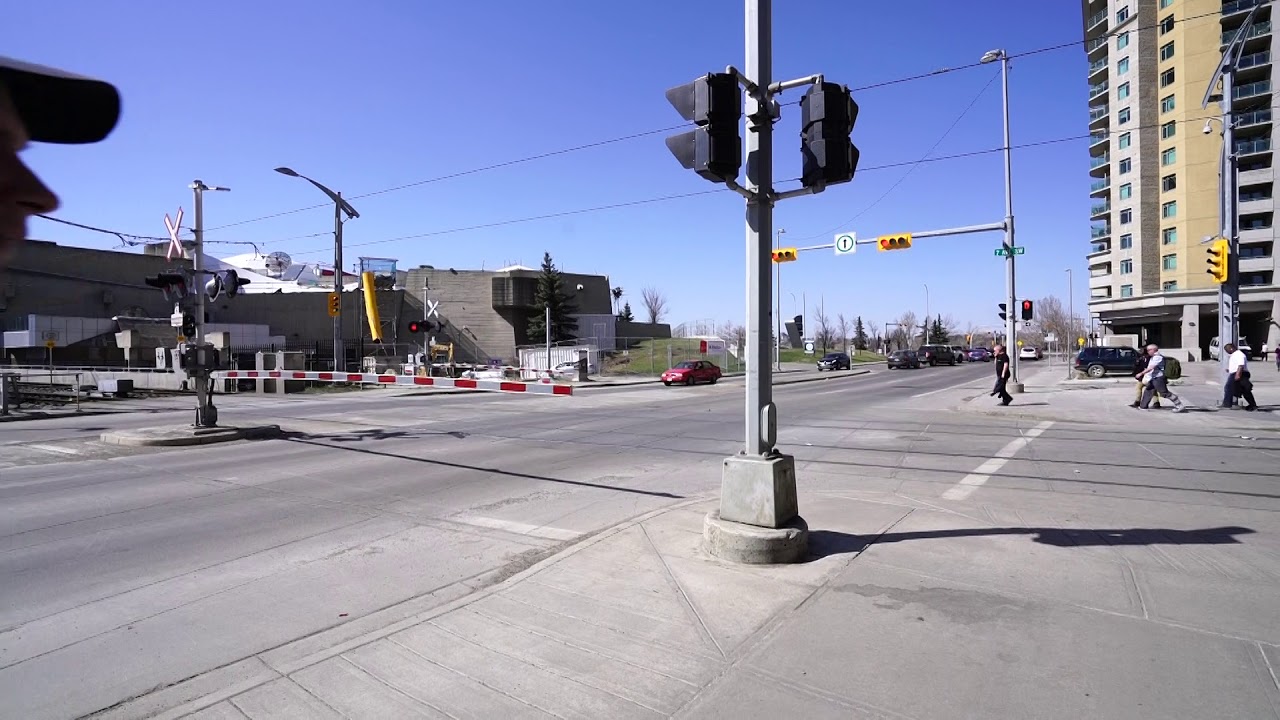 a Railroad crossing, C-Train in Calgary, Canada - YouTube