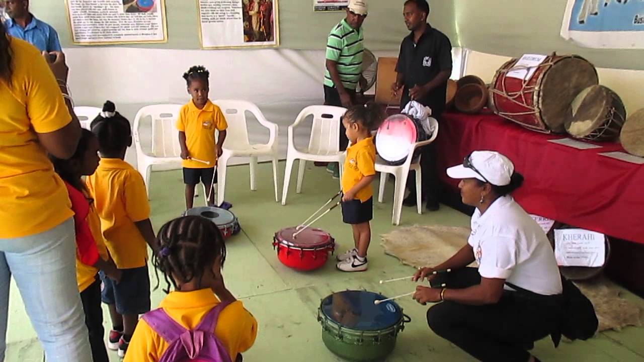 Learning about Tassa Drums in the Carnival Village - YouTube