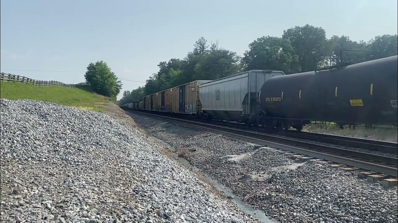 NS 1173 leads NS 143 with an EX-BNSF C44-9W 2nd - YouTube