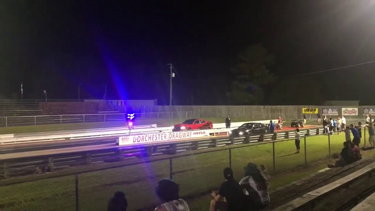 06 STI vs Hellcat - YouTube