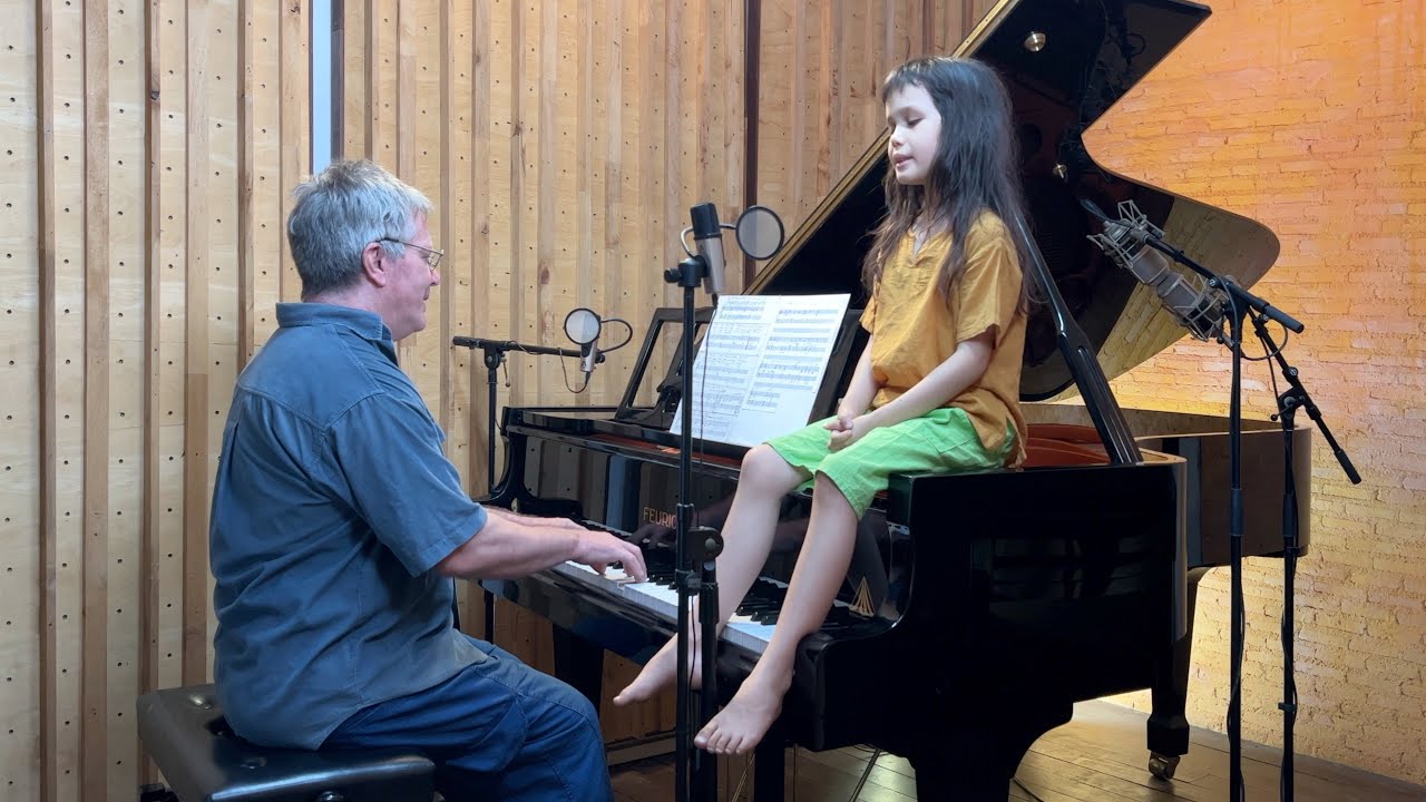 "Thai New Year Song" (พรปีใหม่) Emilie & Dad - YouTube