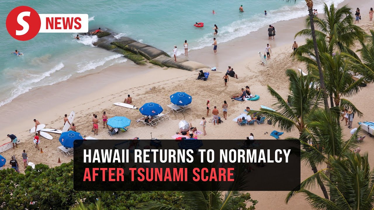 Hawaii returns to normalcy after tsunami advisory lifted - YouTube
