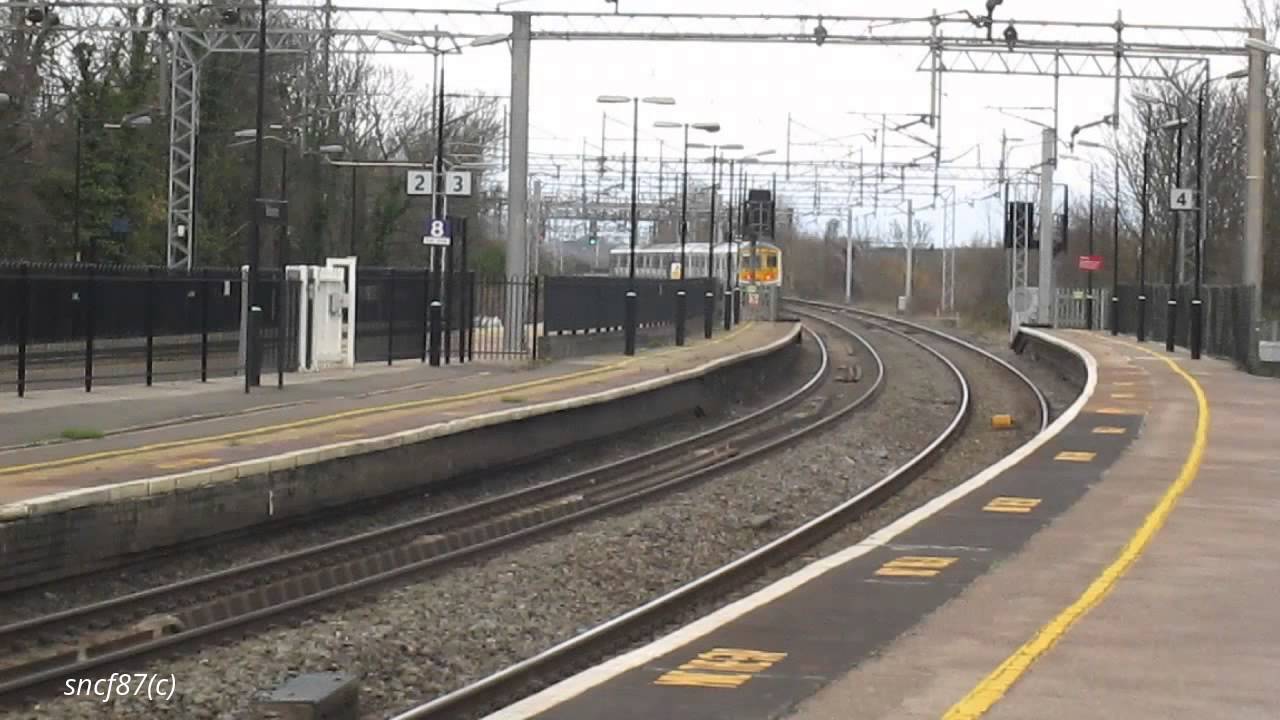 London Midland Class 319 passes at Wolverton - YouTube