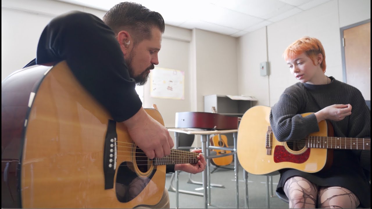 Security Guard starts music class at BA Options Academy - YouTube