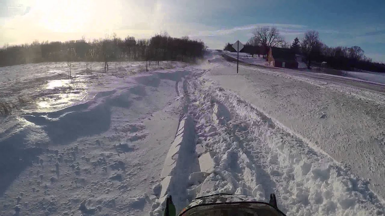 Snowmobiling; Hitting awesome, new, huge drifts! And rolling off my ...