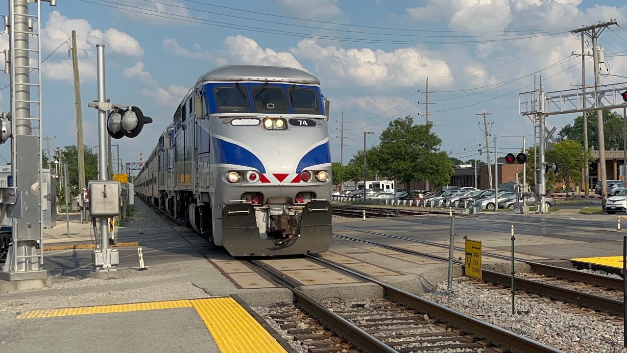 Metra 74 F59phi with a P5 horn leading a express train at Franklin Park ...