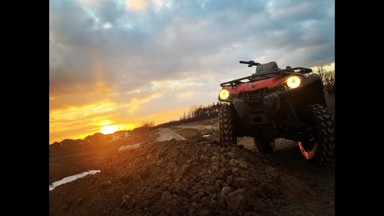 2021 Can Am Outlander 450 Mudding - YouTube