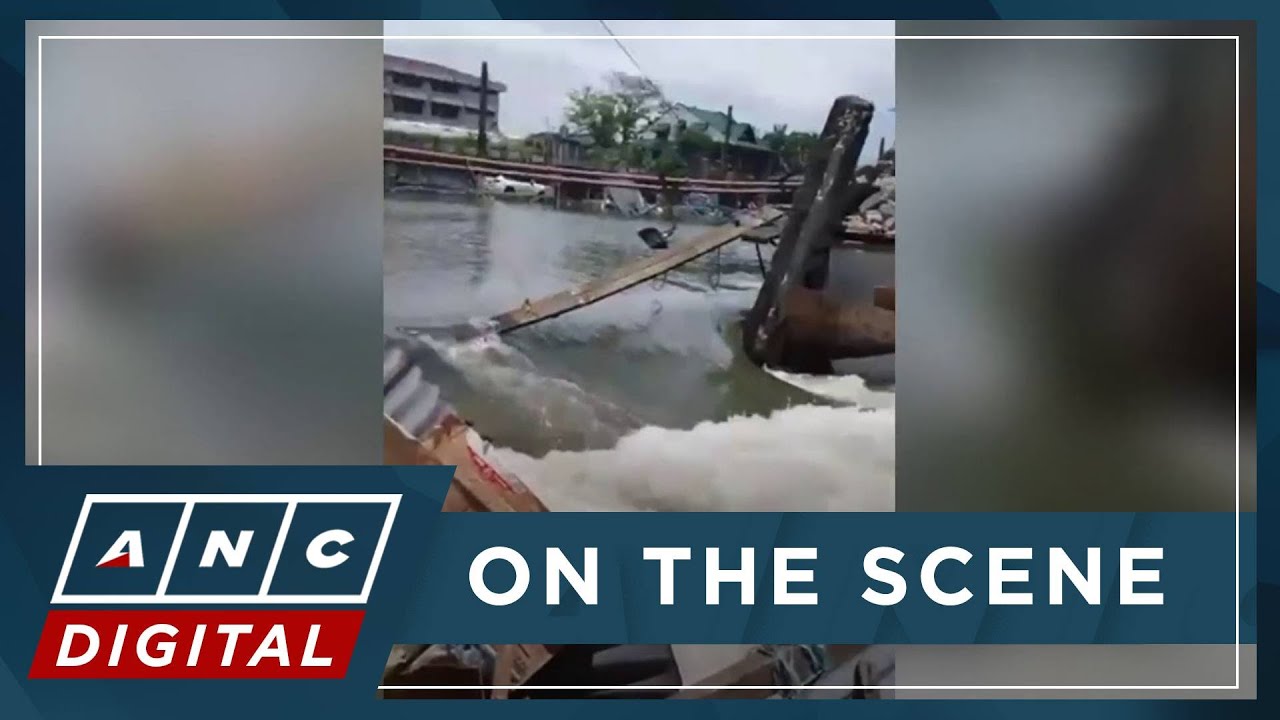 MOMENT: River wall in Navotas collapses amid high tide triggering neck ...