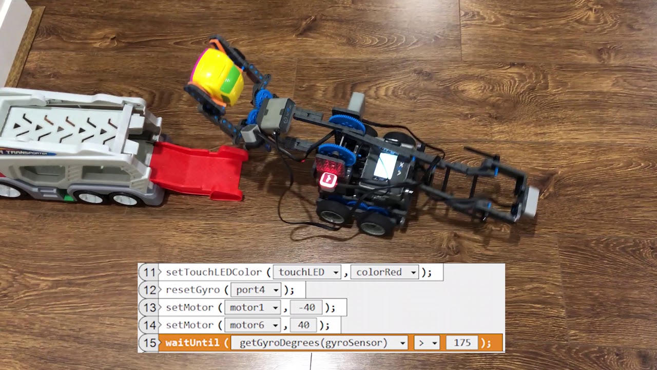 Clawbot IQ programmed using ROBOTC to pick up a yellow car to its destination - YouTube
