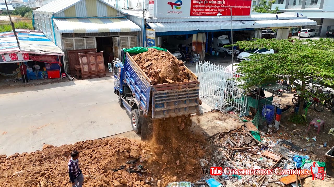 Best Mini Dump Trucks Unloading Soil And Small Bulldozer Pushing Soil ...