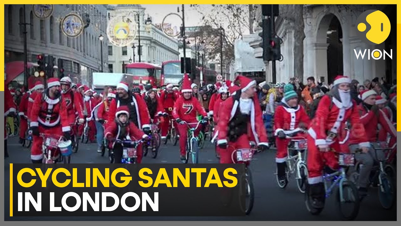 London: 10th Annual 'Santa Cruise' with Army of Santas Marching Down ...