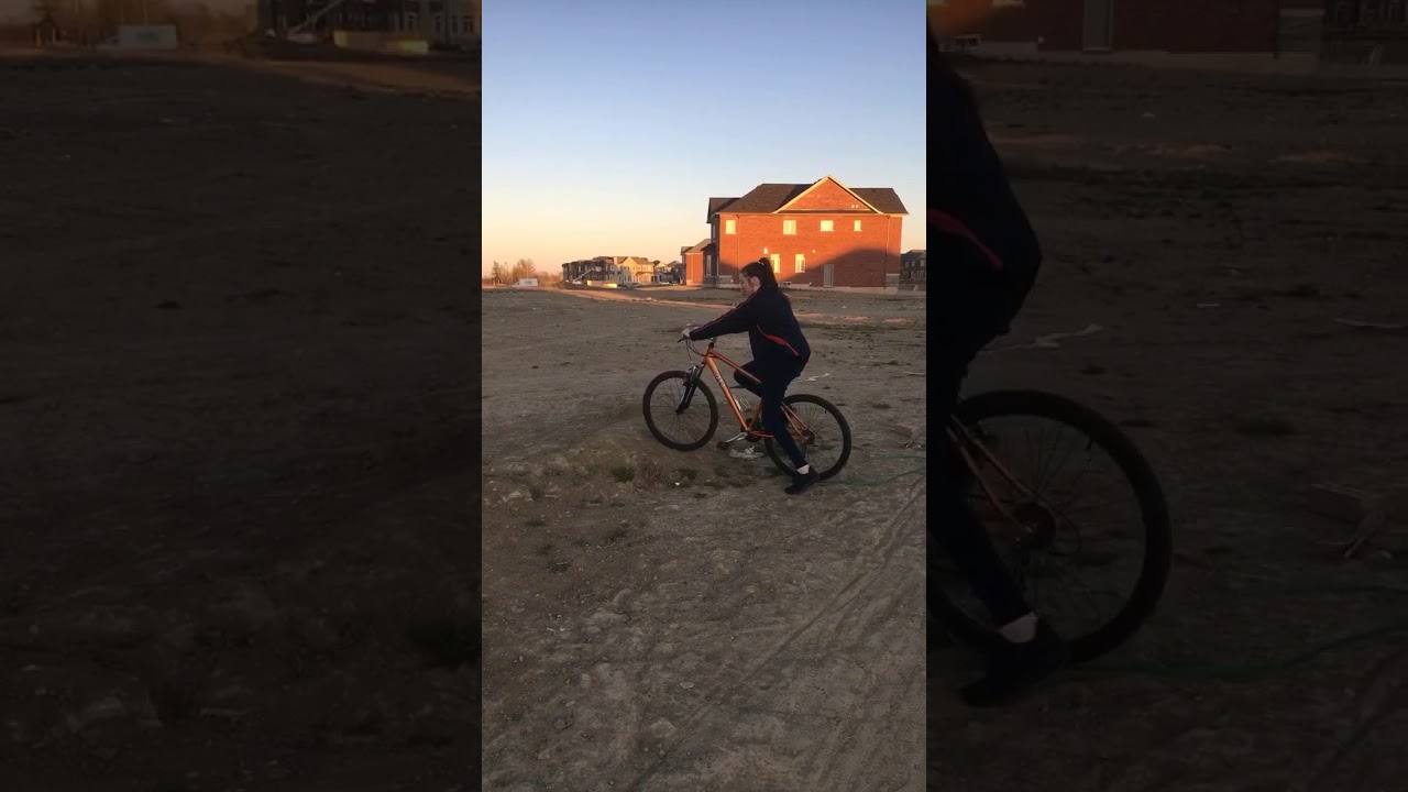 GIRL SENDS MASSIVE JUMP ON BIKE ** FOOTAGE** - YouTube