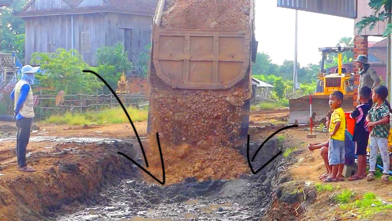 New project...The big dumb truck unloading to build the road /The ...