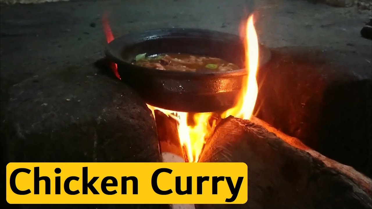 Chicken Curry Recipe Being Cooked Outdoors Primitive Style Cooking On A ...