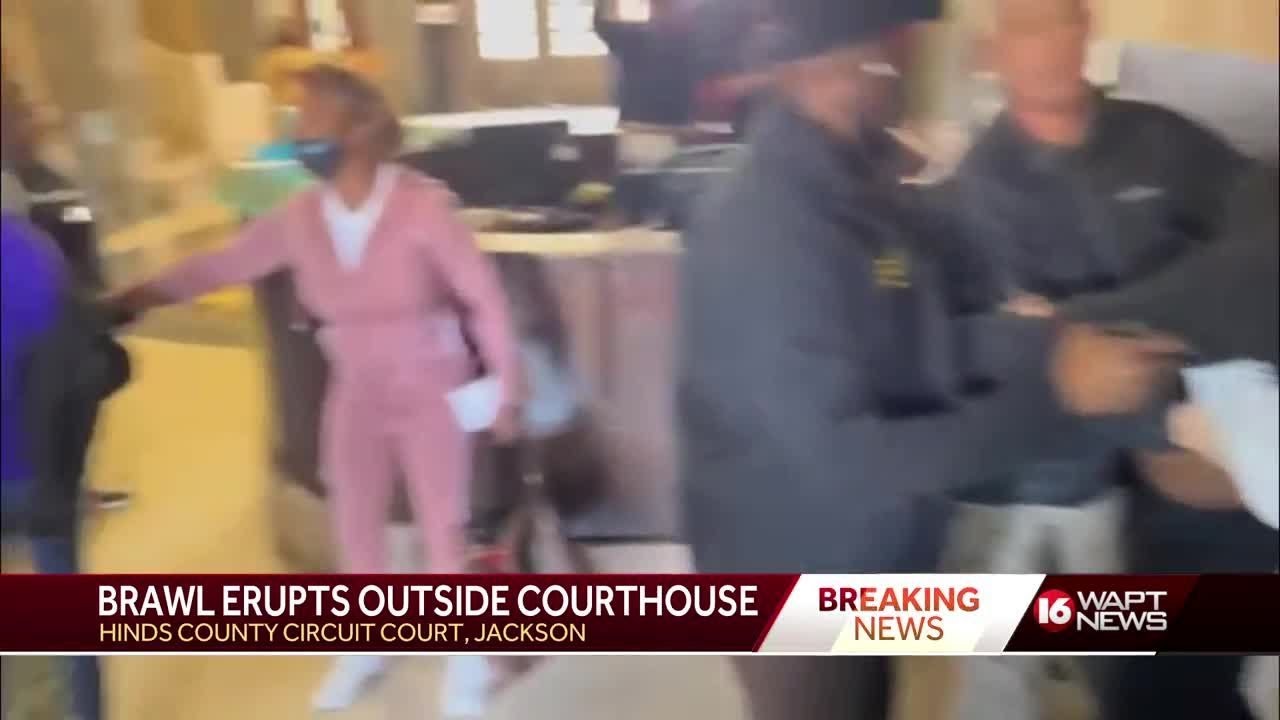 Brawl outside courthouse - YouTube