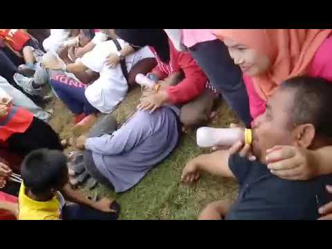 Lomba nyusui Suami