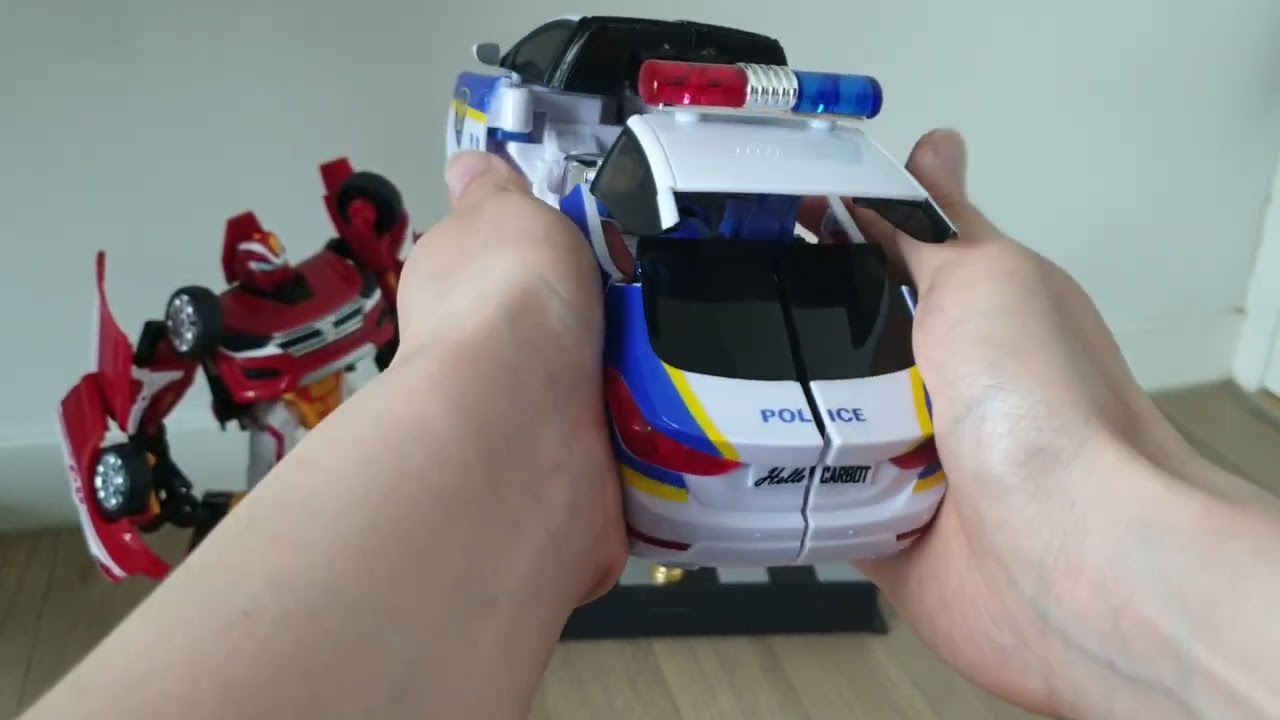 A cool toy police robot transforms into a police car on a chessboard ...