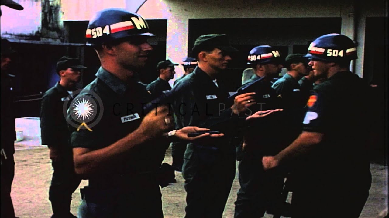 A Seargent inspects MPs in ranks and signs for the 504th MP Battalion A ...