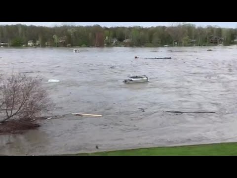 Flooded Sanford Lake filled with debris - YouTube