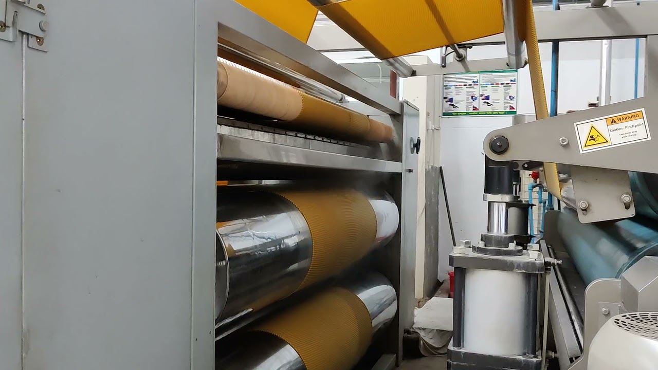 Knit Fabric Stenter Machine with Pre-heat unit at a glance | Dyeing ...