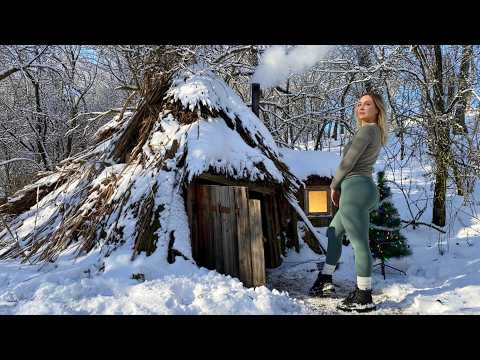 Secret and Cozy Reed Bushcraft Shelter. Warmth and comfort for a girl